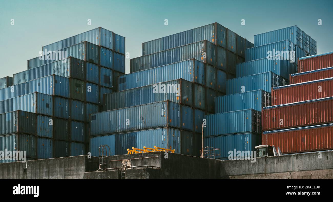 Shipping containers waiting in stacks in the Hamburg Port Stock Photo ...