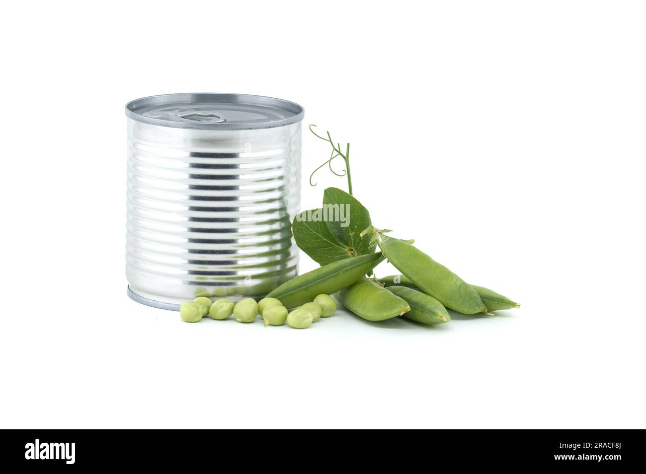 Tin can alongside fresh garden peas pods with green leaves isolated on ...