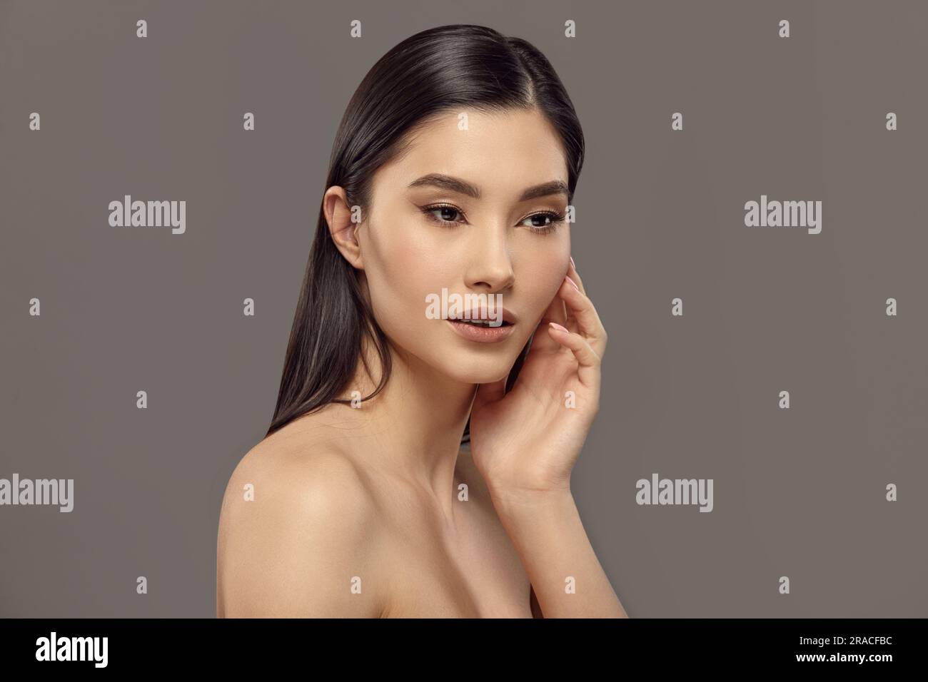 Girl touching her face with hands enjoying soft smooth skin Stock Photo ...