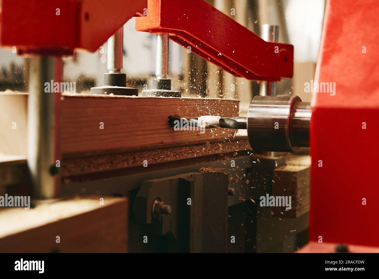 Milling machine cuts a hole for locks, hinges and keyholes Stock Photo ...
