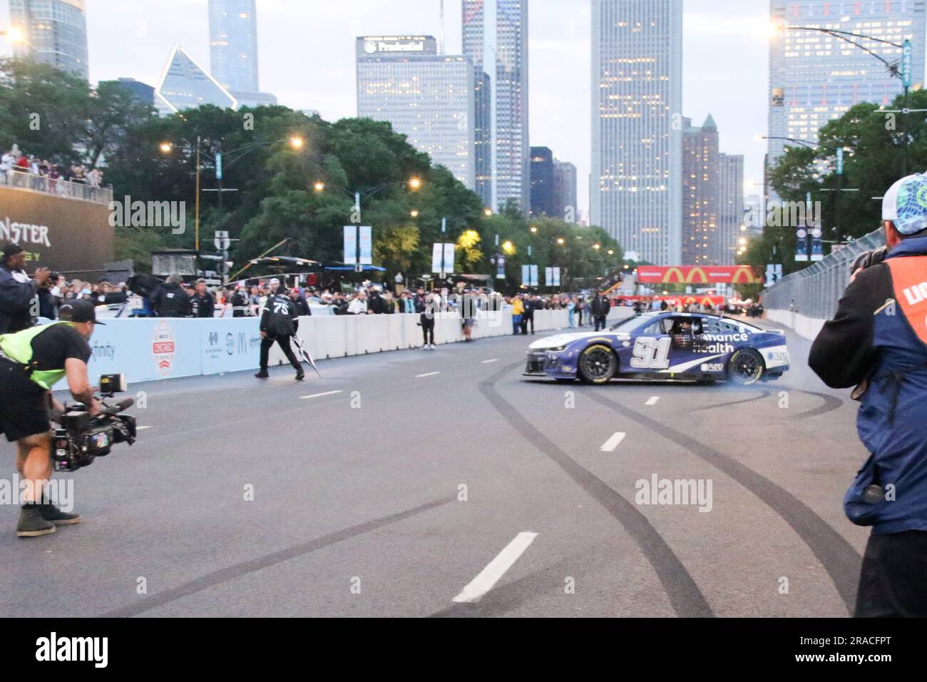 Shane van Gisbergen does some donuts in victory lane after getting ...