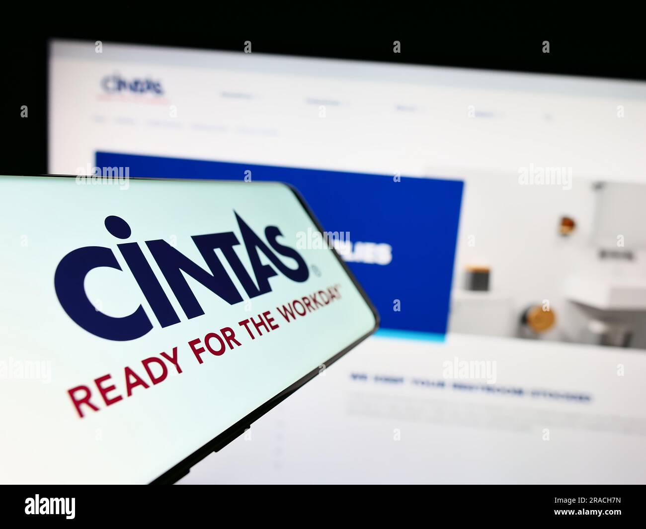 Smartphone with logo of American company Cintas Corporation on screen ...