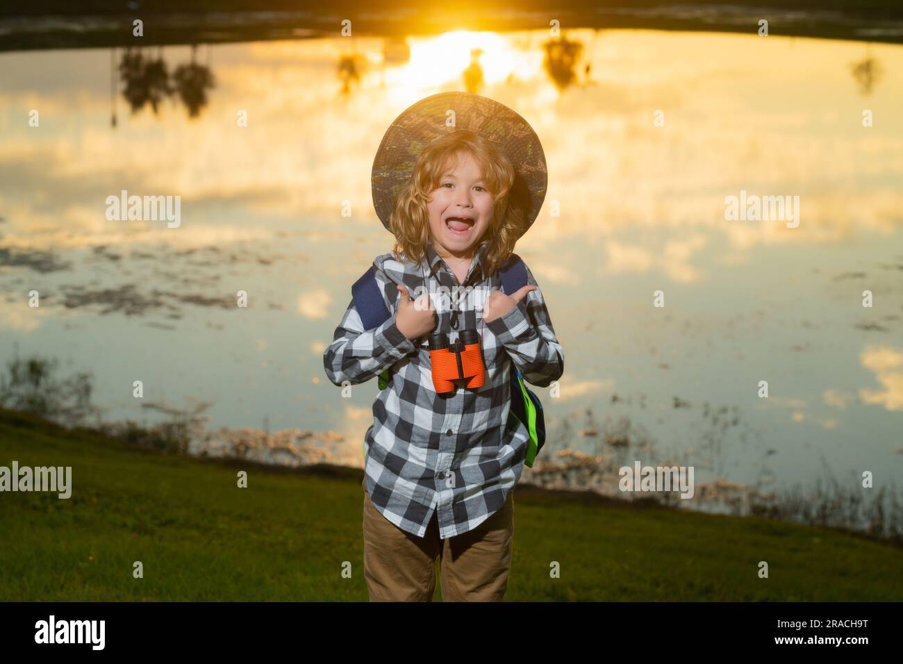 Travel and adventure concept. Little child boy tourist explorer with ...