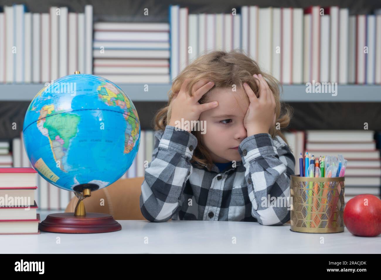 Tired and bored pupil. Nerd pupil. Clever child from elementary school ...
