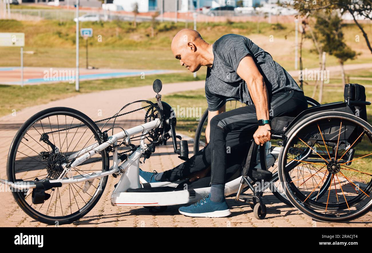 Wheelchair, athlete or a man with a disability and bike for handicap ...