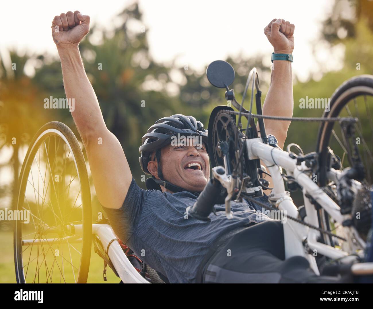 Winner, athlete and a man with a disability and bike for handicap for ...