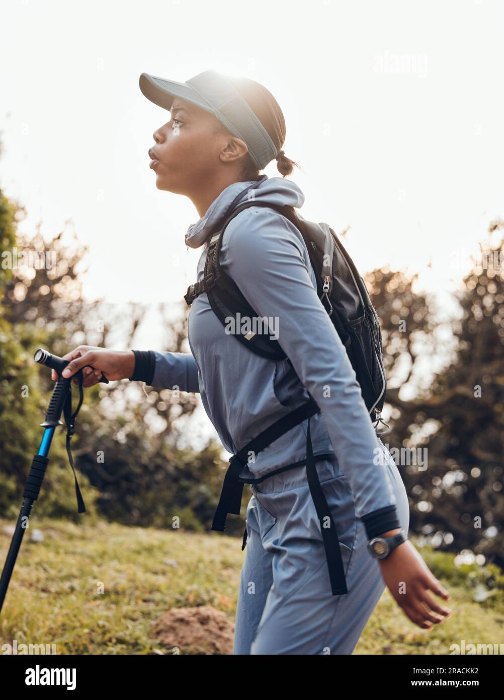Hiking, fitness and black woman in nature walking for exercise, cardio ...