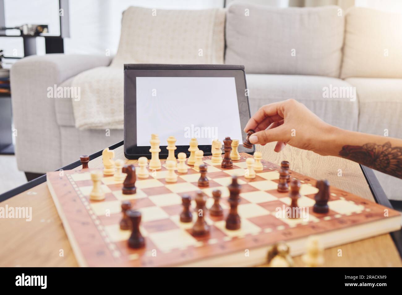 Video call, chess and woman in home with tablet, mockup and screen for ...
