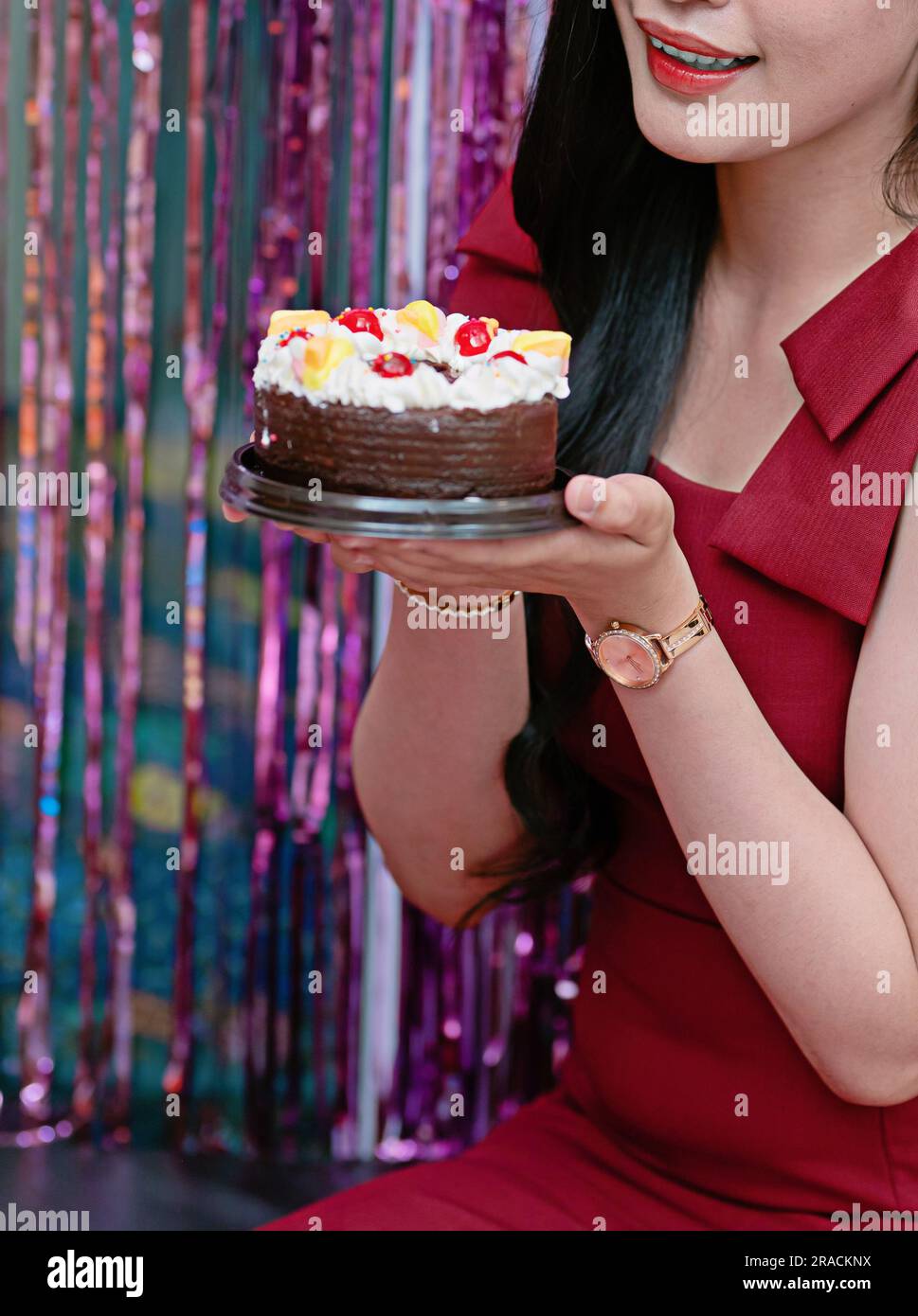 girl's hand holding a birthday cake Focus on the happy moments Stock ...