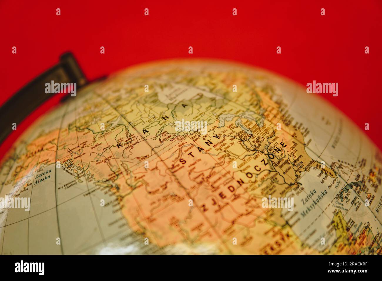 detail of a globe model with political map on the red background Stock ...