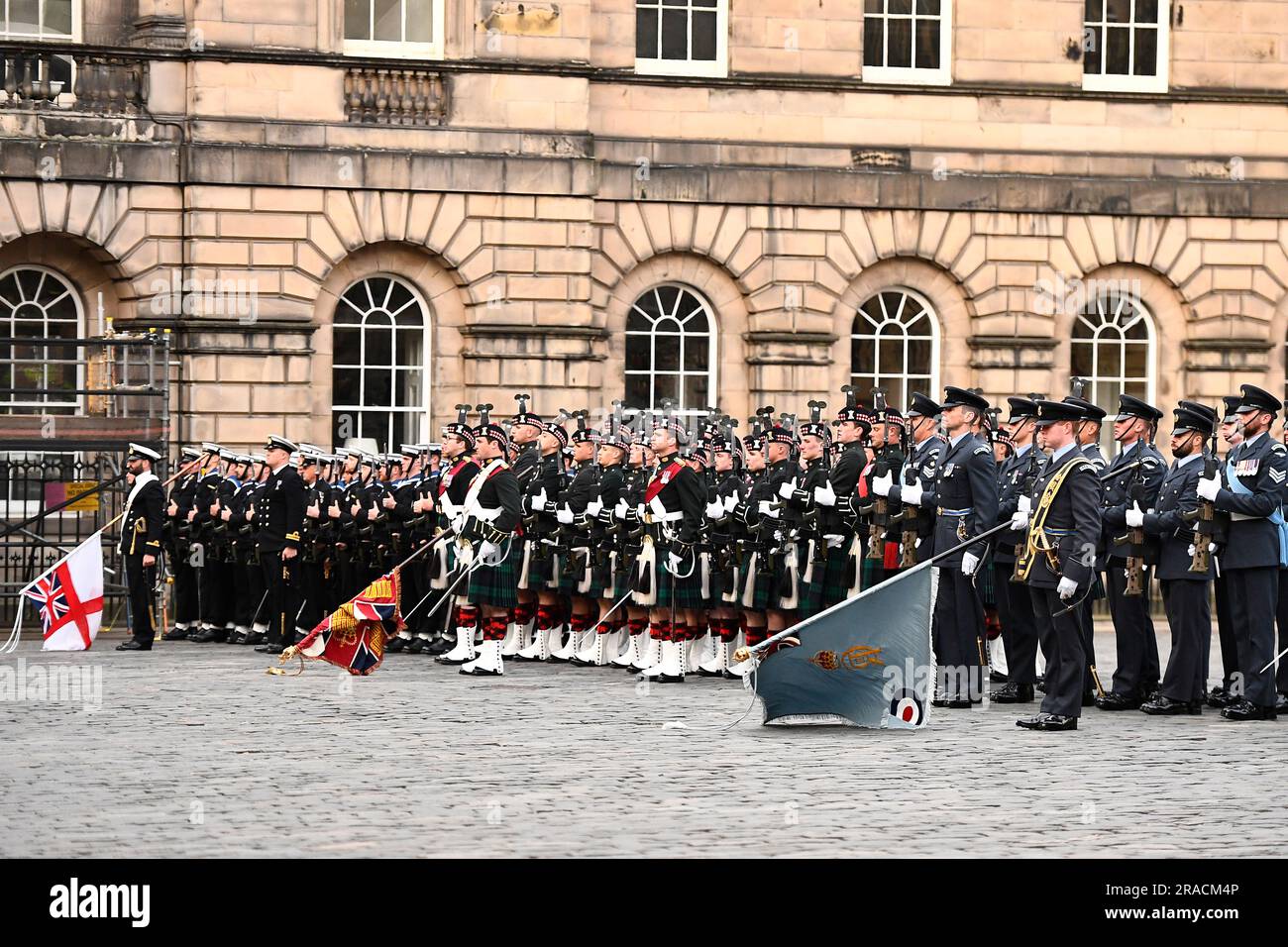 An early morning procession rehearsal takes place along the Royal Mile ...