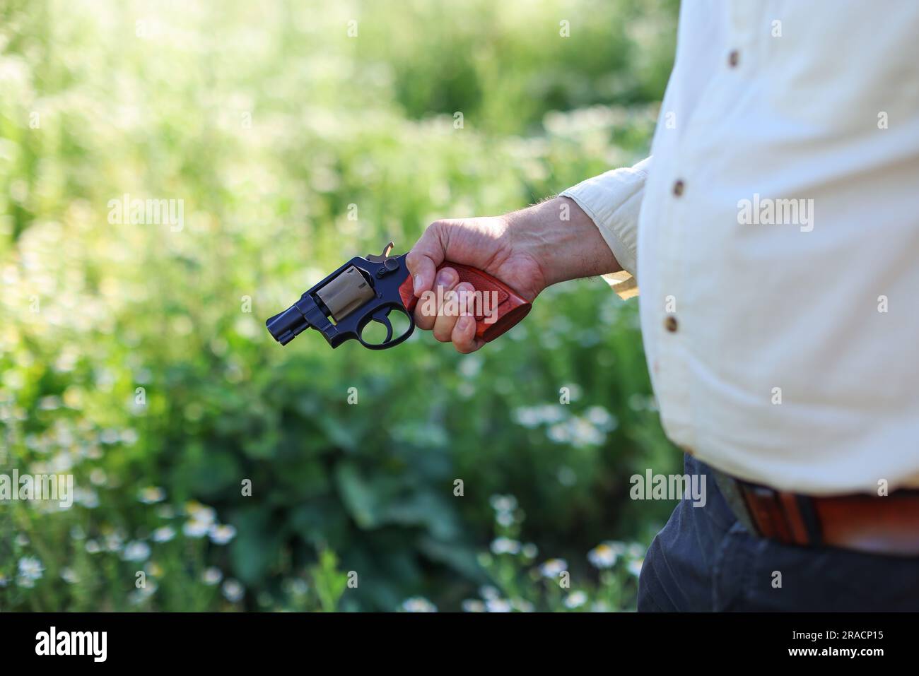 one caucasian spy criminal policeman detective man holding gun Stock ...