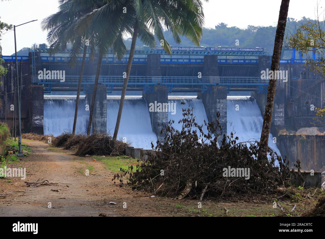 Water rushing through gates at the peruvannamuzhi (peruvannamoozhi) dam ...