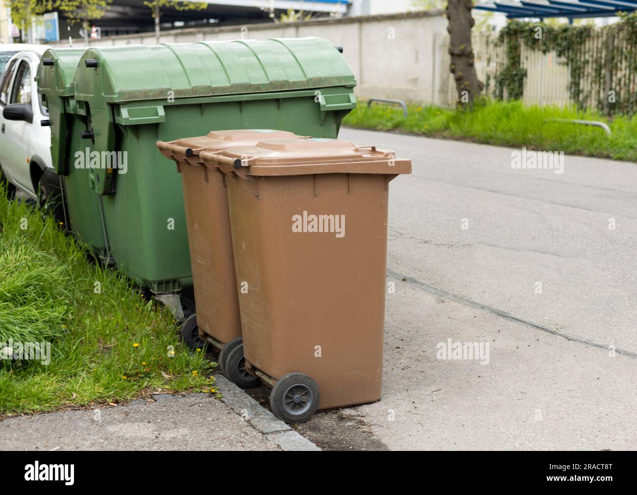 many trash can in row in city urban environment.basket full of garbage ...