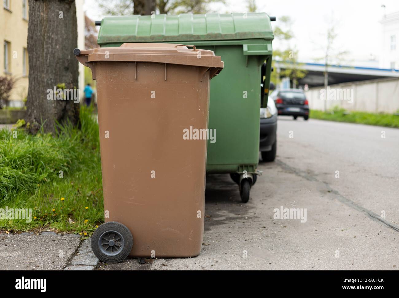 many trash can in row in city urban environment.basket full of garbage ...