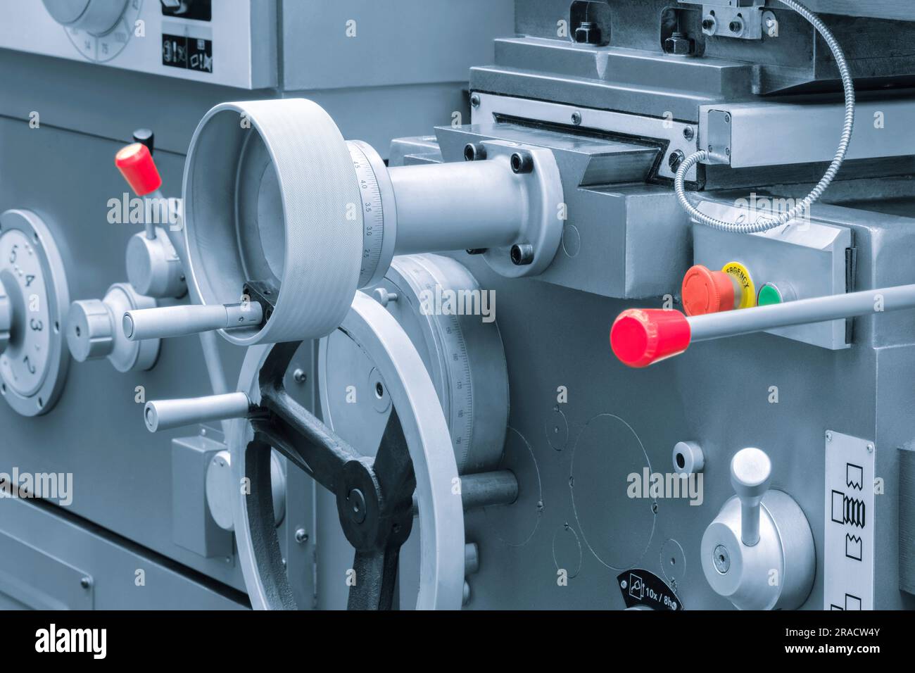 Lathe control knobs close up blue tone. Metal machine tools industry ...