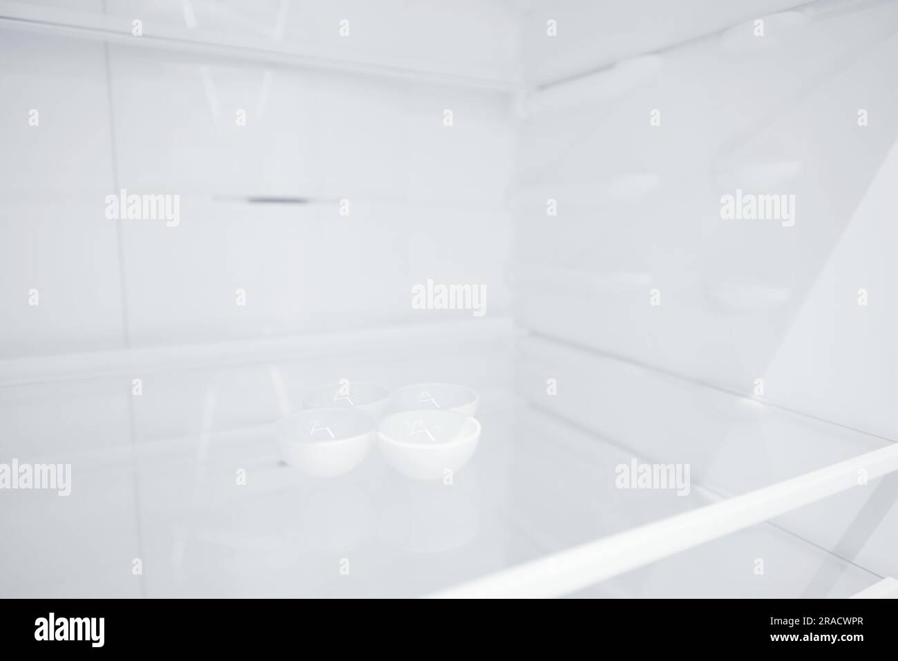 An empty refrigerator. Inside an empty, clean refrigerator, a ...