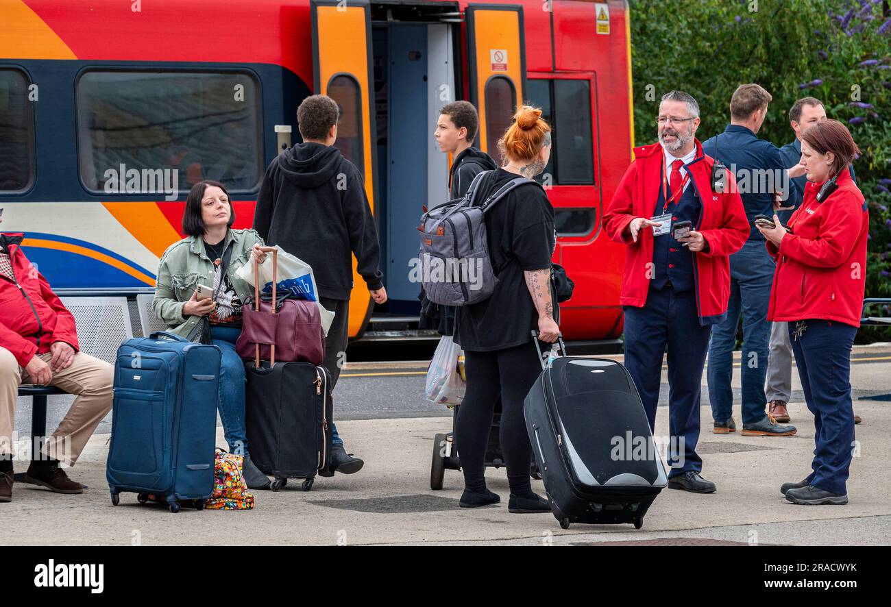 Grantham Train Station, Lincolnshire, UK – LNER Station staff stood on ...