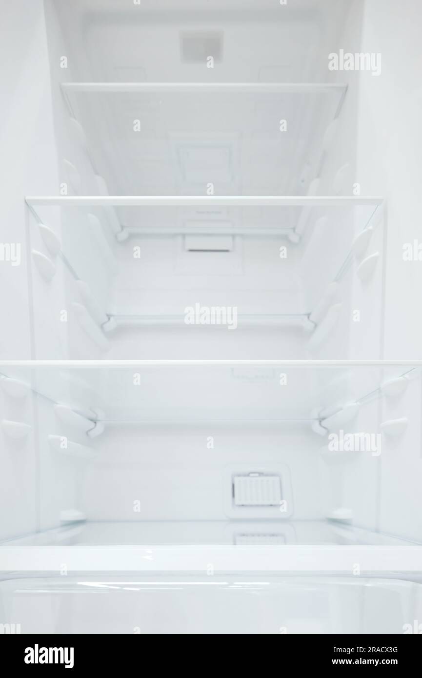 An empty refrigerator. Inside an empty, clean refrigerator, a ...