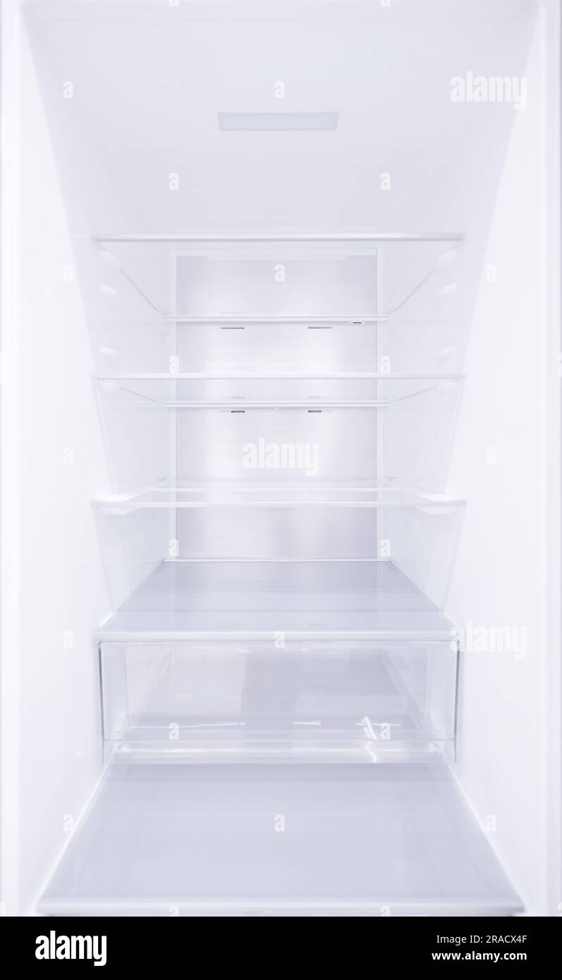An empty refrigerator. Inside an empty, clean refrigerator, a ...