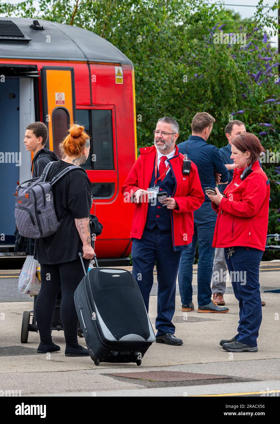 Grantham Train Station, Lincolnshire, UK – LNER Station staff stood on ...