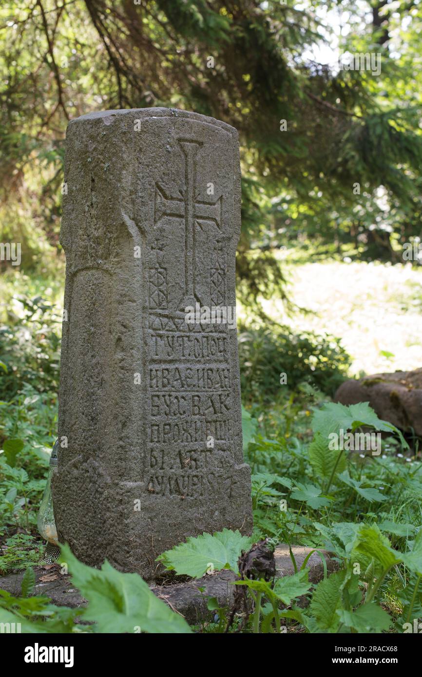 Historic tombstone, cemetery in the forest, abandoned. A historic ...
