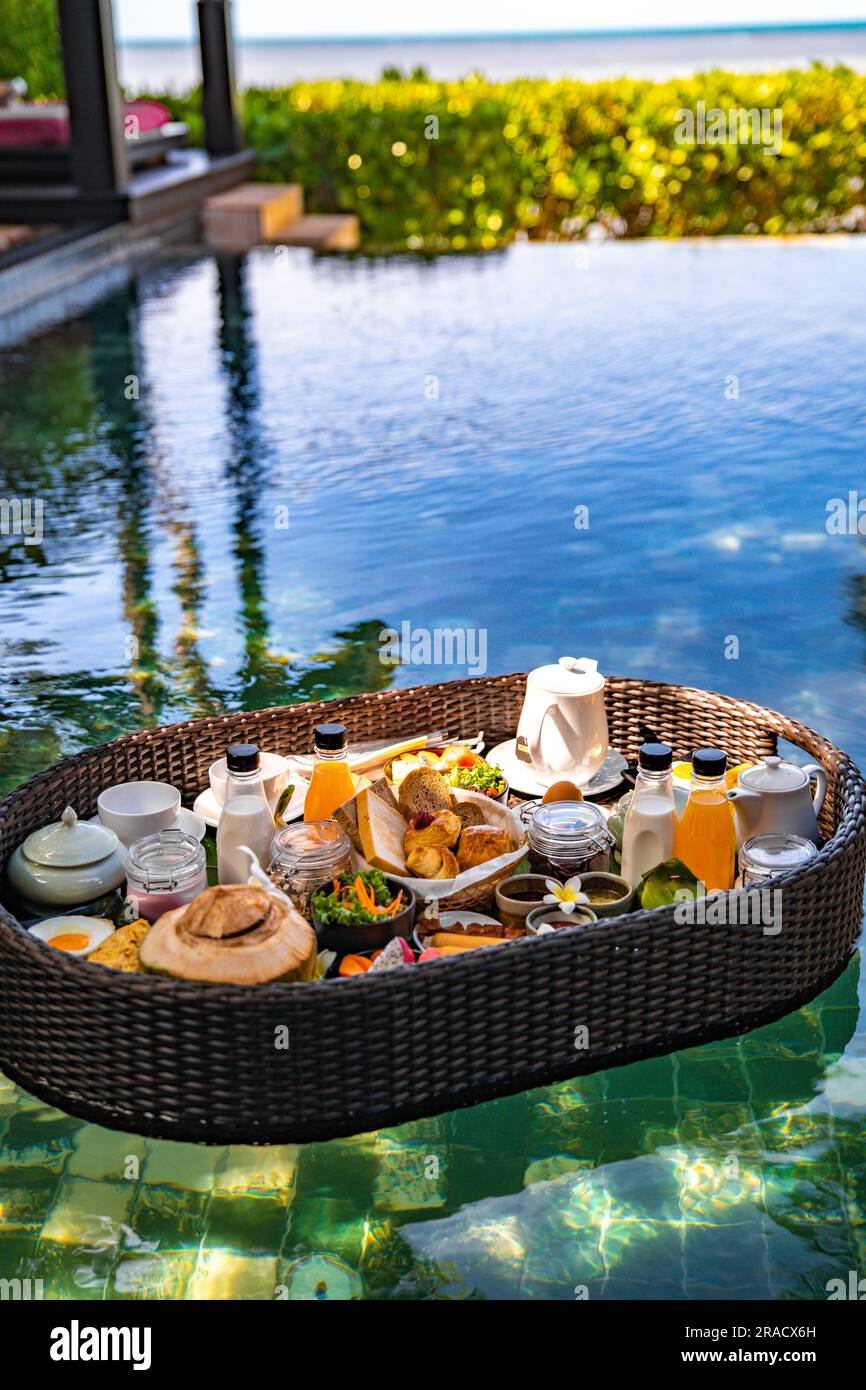 Floating breakfast in pool in Lamai beach resort in Koh Samui, Thailand ...
