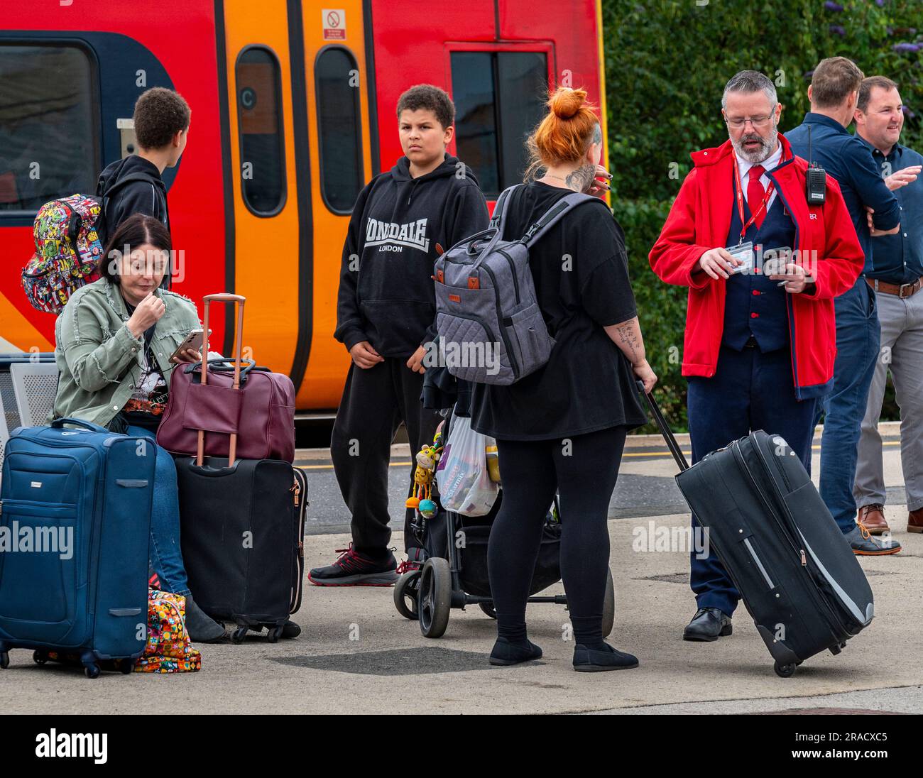 Grantham Train Station, Lincolnshire, UK – LNER Station staff stood on ...