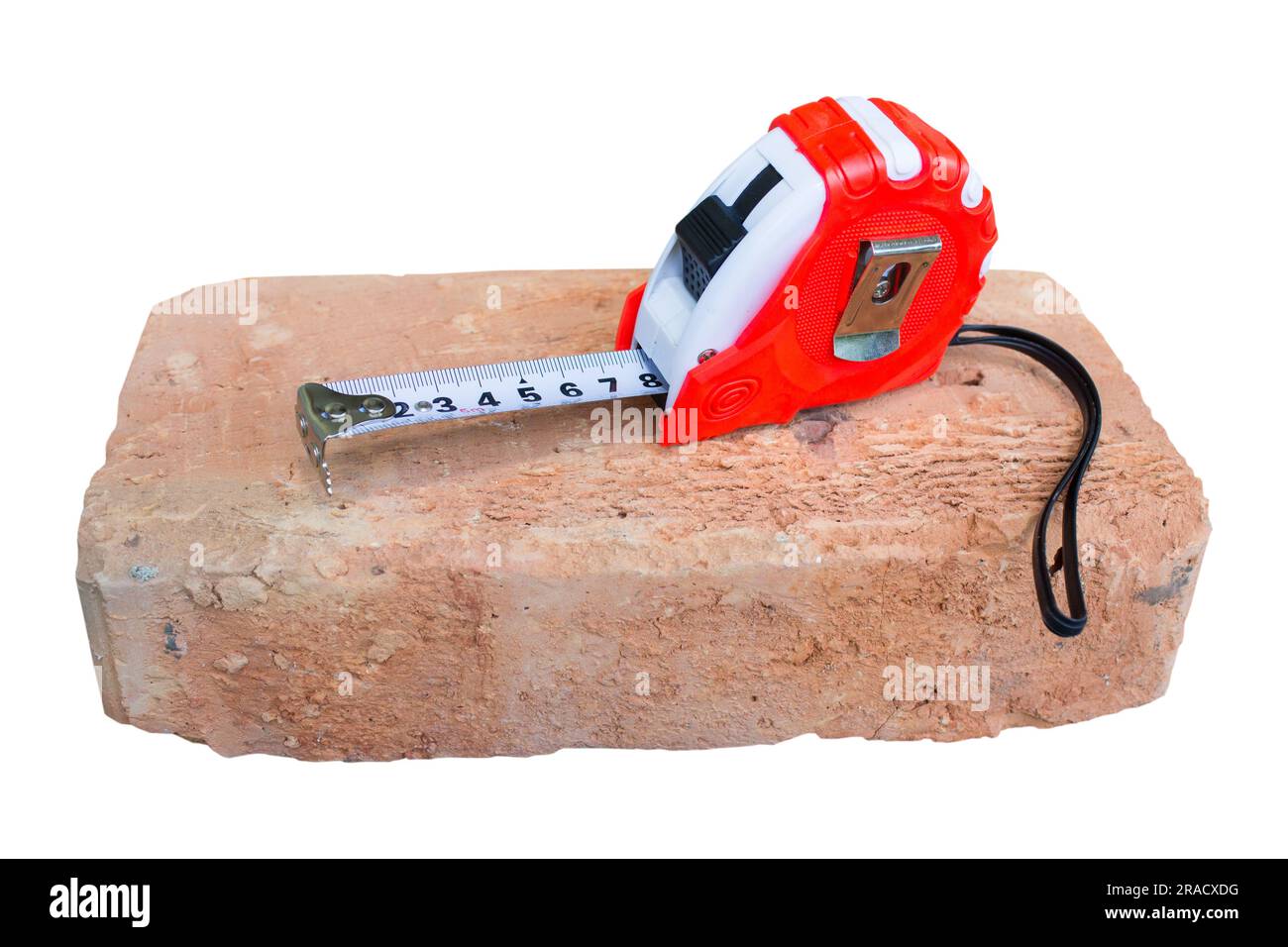 tape measure lying the red brick isolated Stock Photo - Alamy