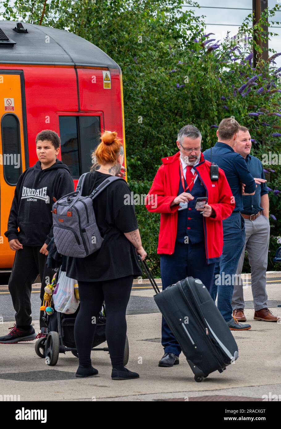 Grantham Train Station, Lincolnshire, UK – LNER Station staff stood on ...