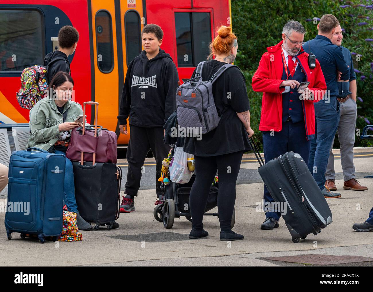 Grantham Train Station, Lincolnshire, UK – LNER Station staff stood on ...