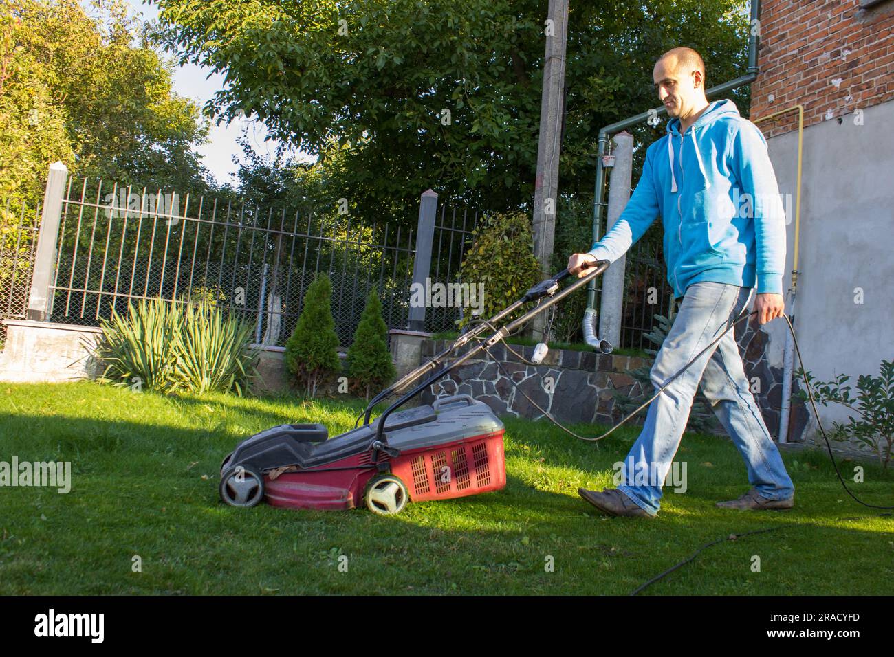 Mows grass hi-res stock photography and images - Alamy