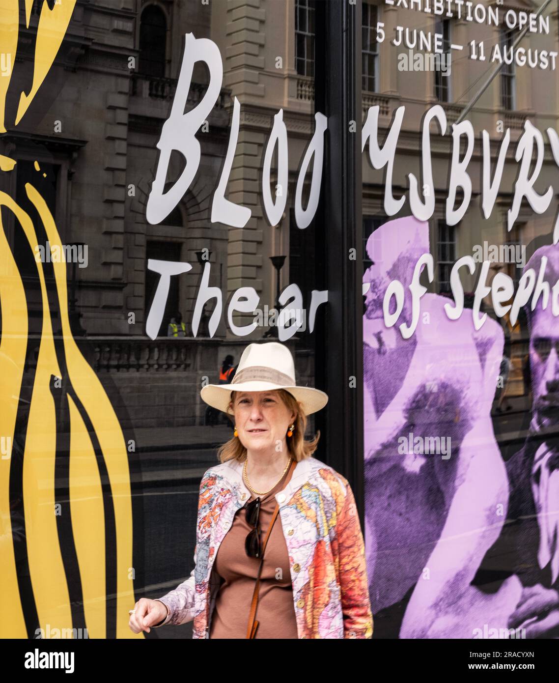 Woman wearing a Burberry jacket and a Lock Panama outside the Philip ...