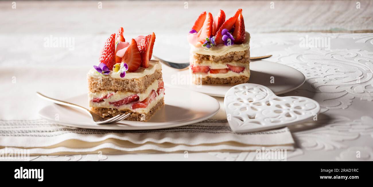 Strawberry and pistachio layer cake Stock Photo - Alamy