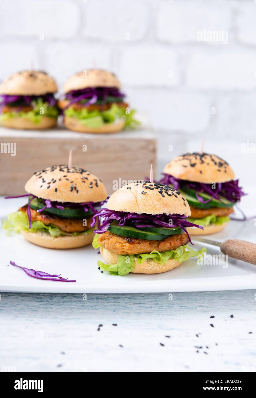 Vegan mini burgers with red cabbage and fried soya medallions Stock ...