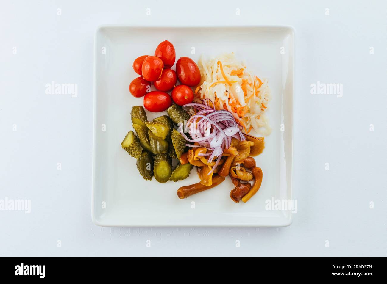 Mixed pickles with tomatoes and red onions Stock Photo - Alamy