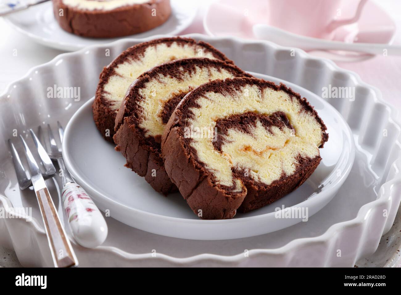 Hurricane-Swiss-Roll (sponge roll) with cocoa Stock Photo - Alamy