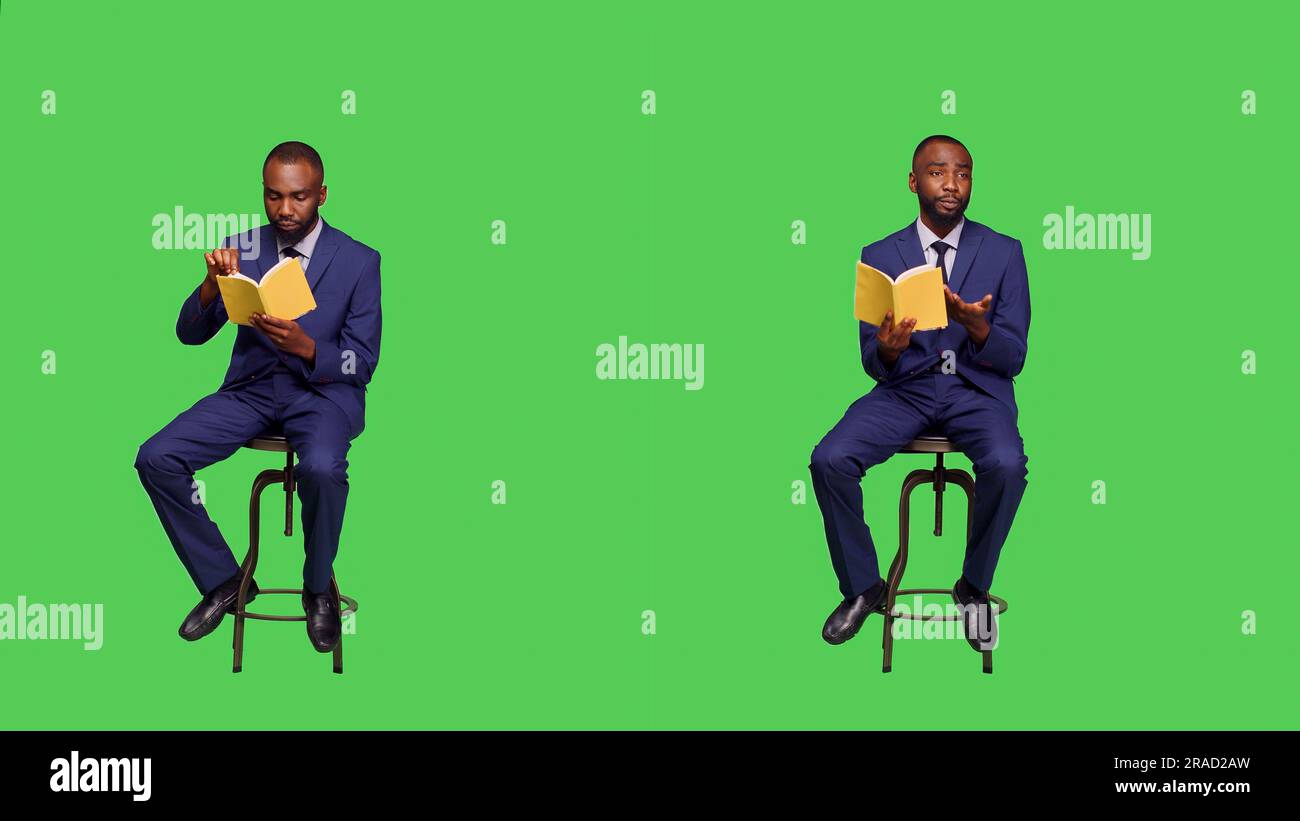 Male employee holding greenscreen on hi-res stock photography and ...