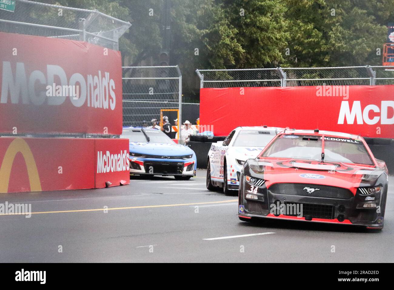 The race cars do laps on the course of the NASCAR Cup Series Chicago ...