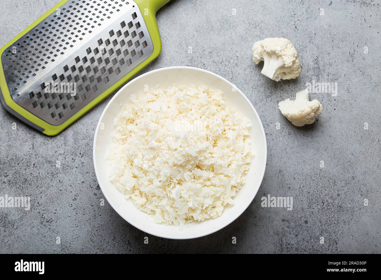 Raw cauliflower rice Stock Photo - Alamy