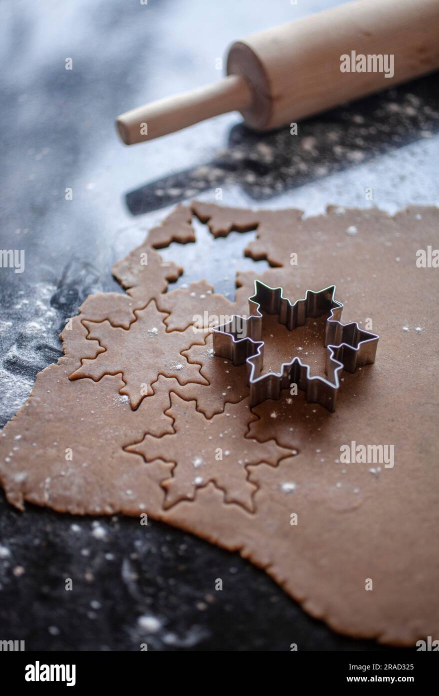Cut gingerbread out dough hi-res stock photography and images - Alamy