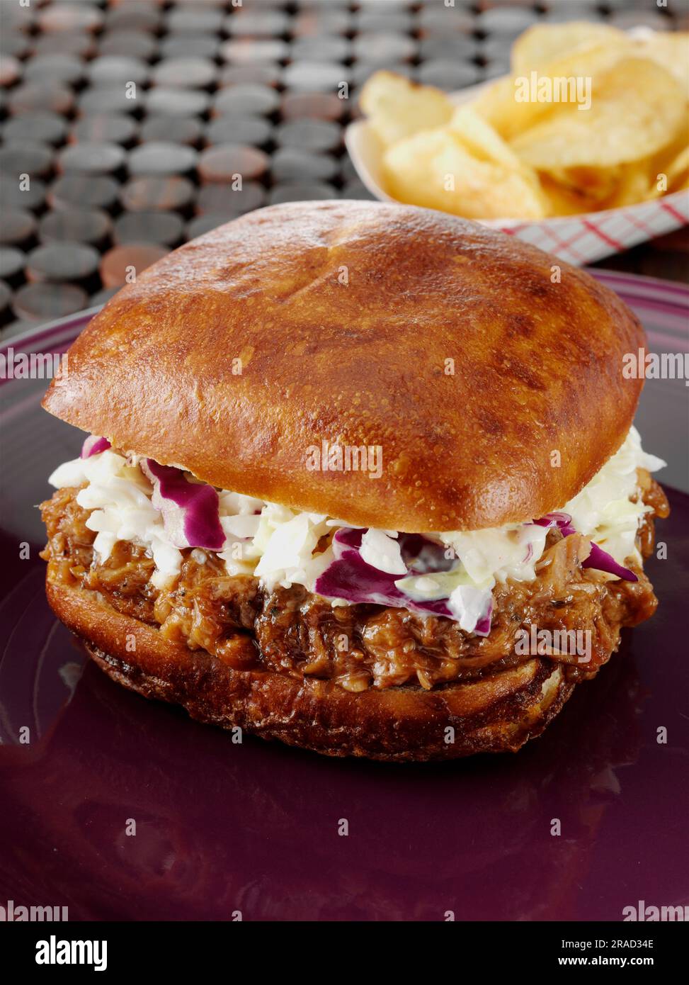 Ciabatta roll with BBQ pulled pork and red cabbage salad Stock Photo ...
