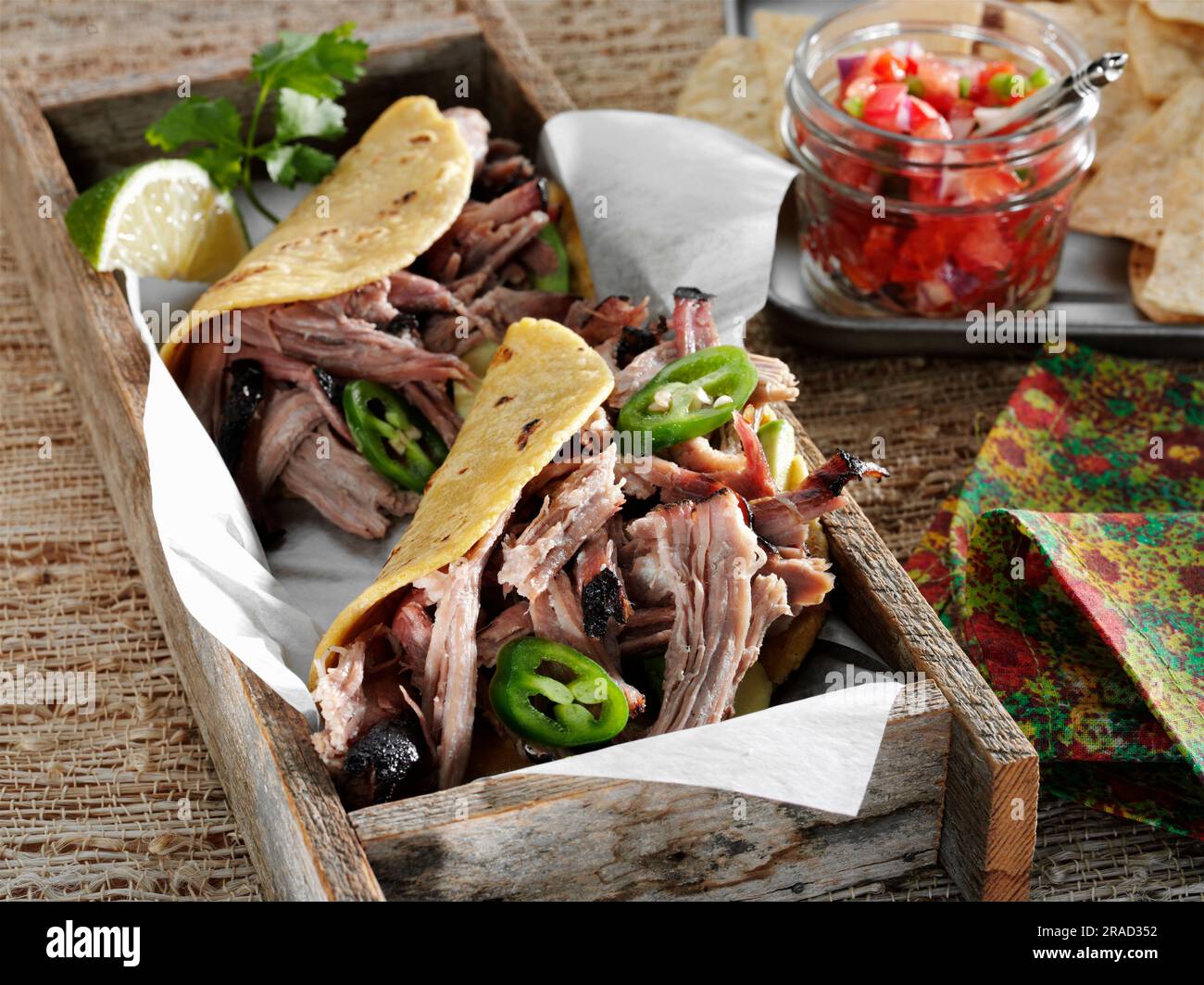 Tacos with smoked pulled pork and jalapenos Stock Photo - Alamy