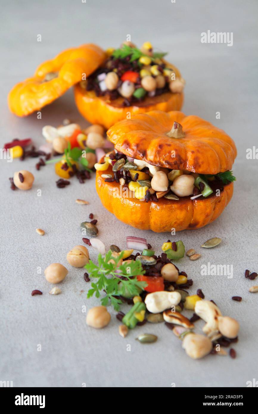 Vegetarian stuffed mini roasted pumpkins Stock Photo - Alamy