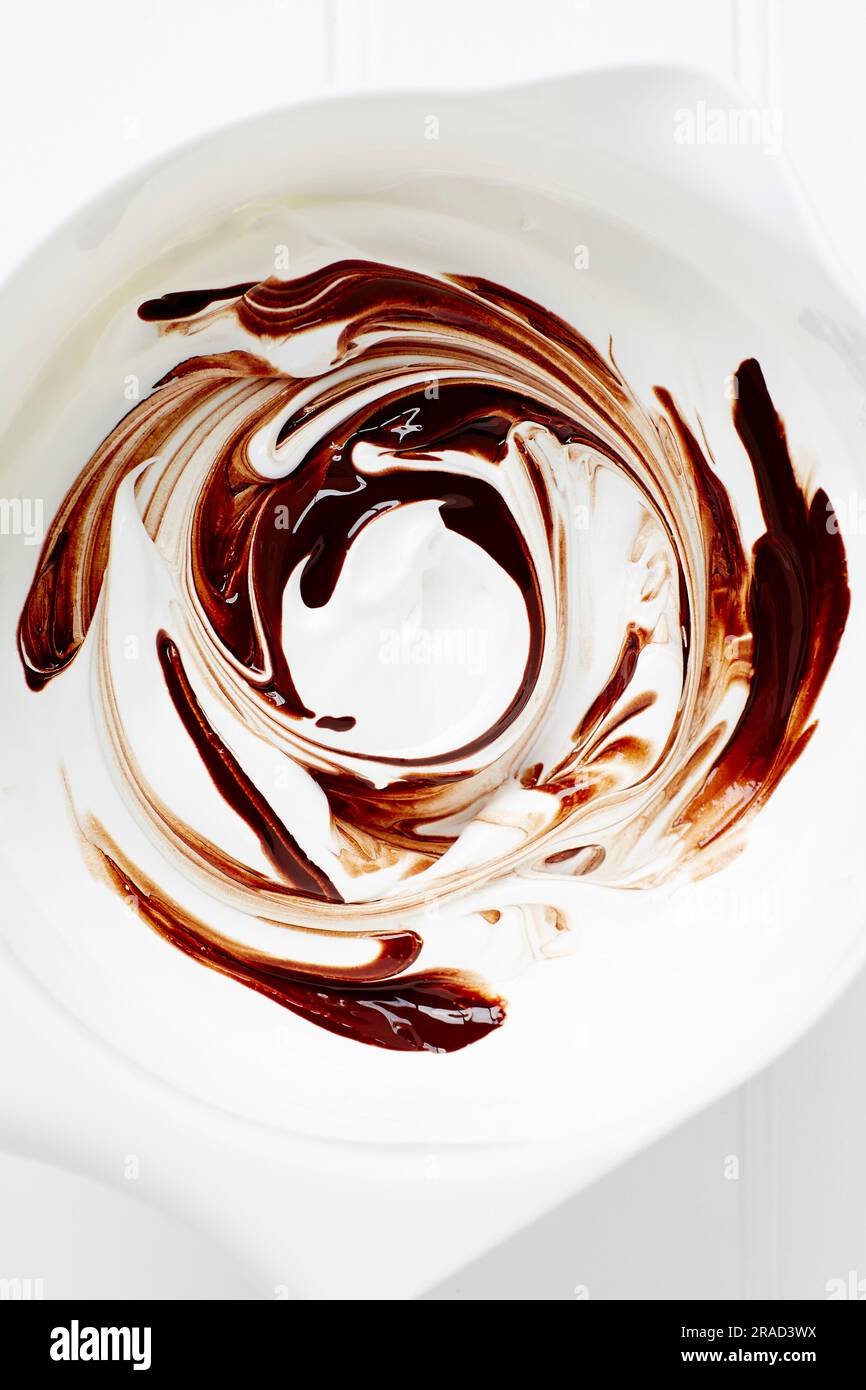 Stirring chocolate mixture hi-res stock photography and images - Alamy