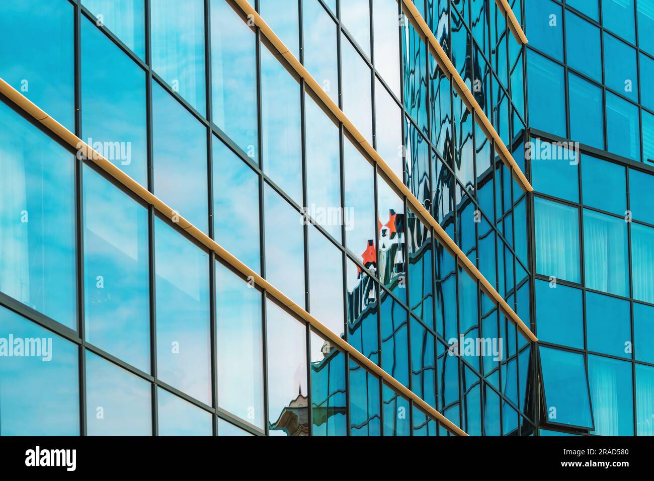 Modern glass facade of corporate business office building in financial ...