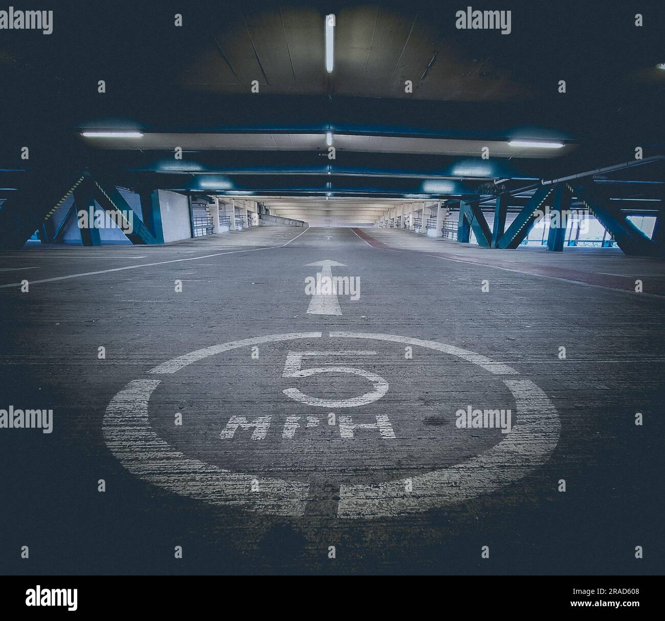 This compelling image captures a parking space with a clear and ...