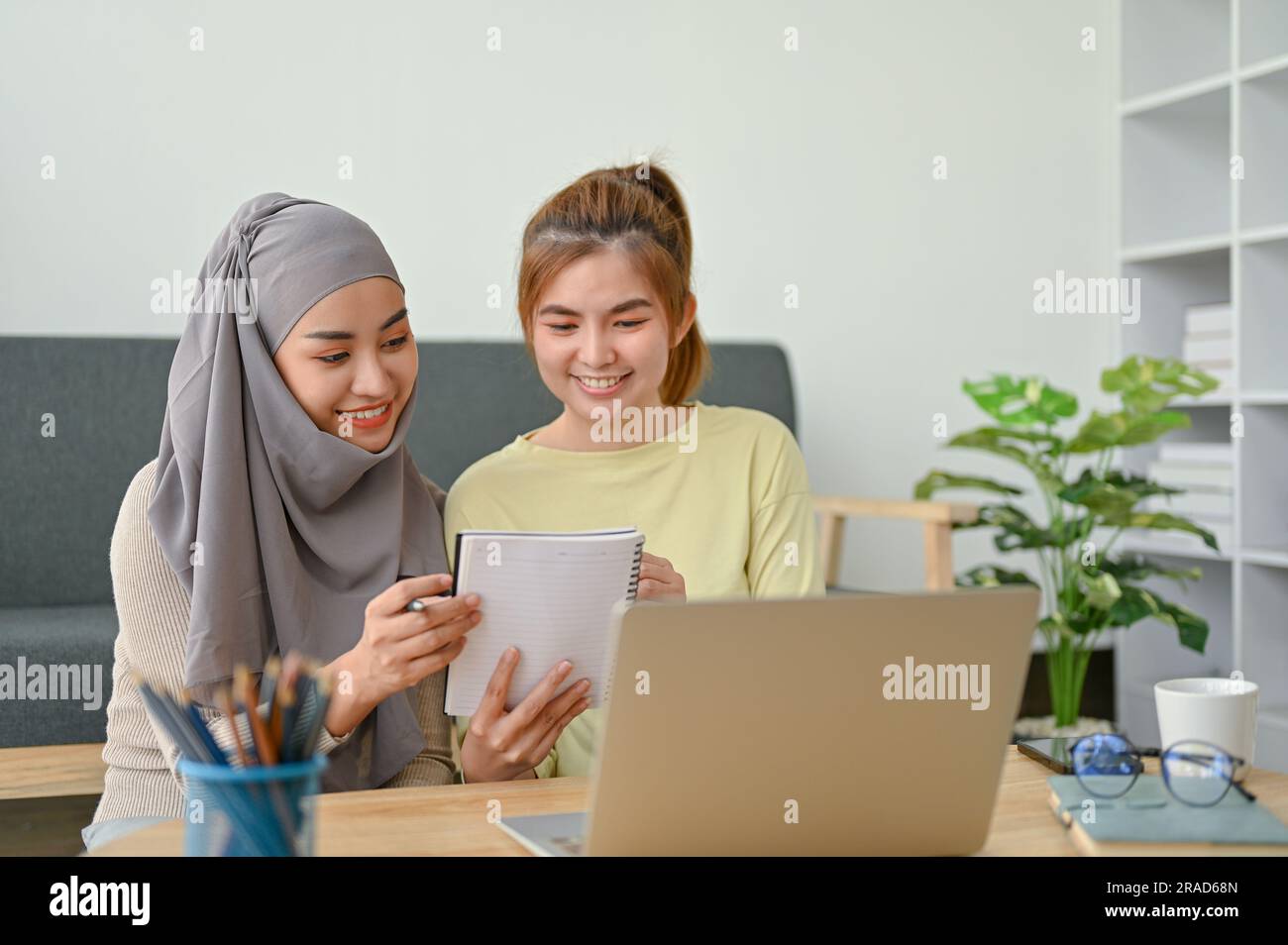 Group of young student study together in their time, muslim woman ...