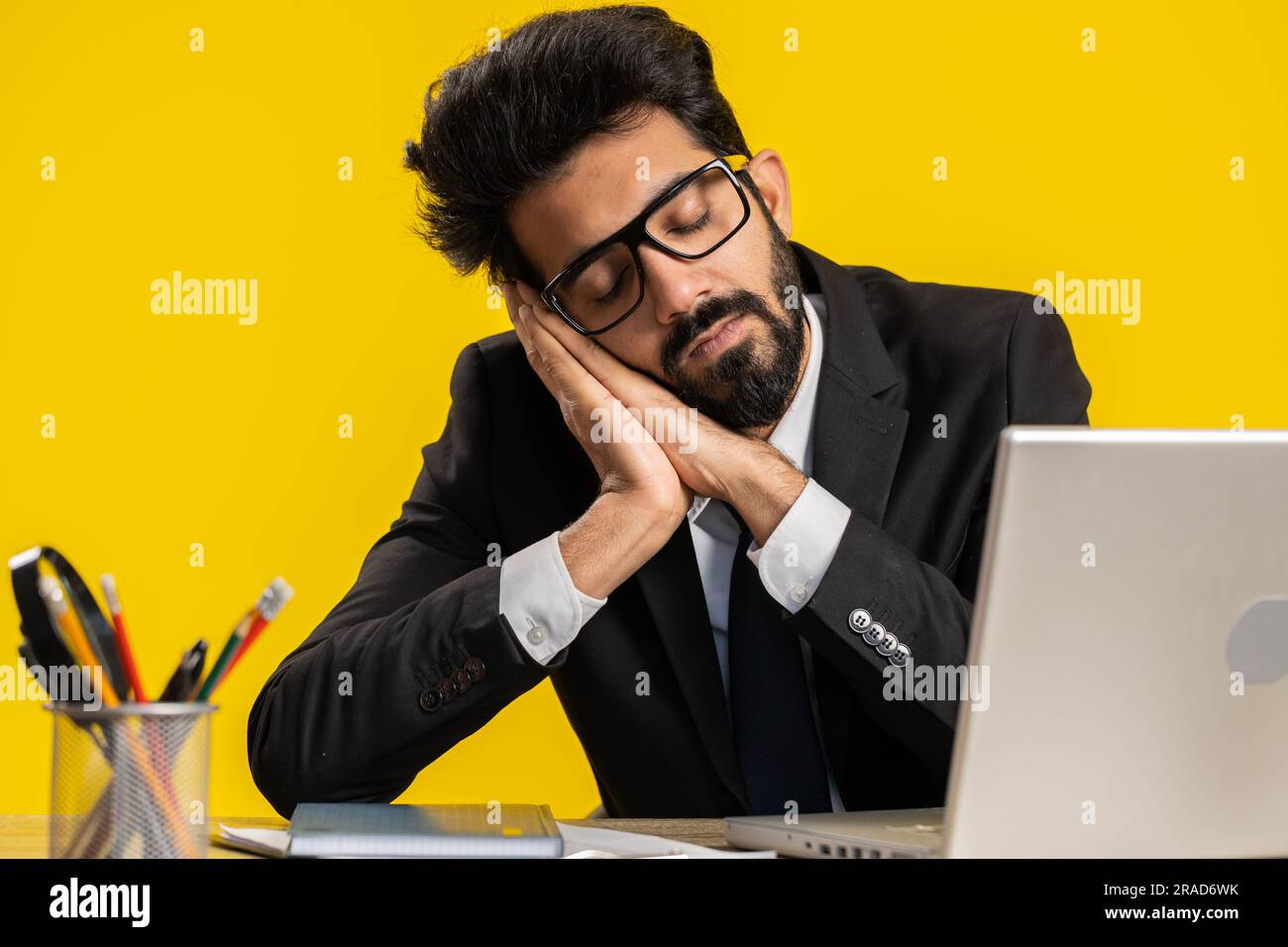 Indian man yawning leaning hi-res stock photography and images - Alamy