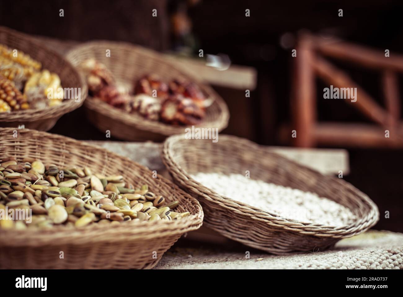 woven baskets of native seeds grains and maze in sacred valley Stock ...